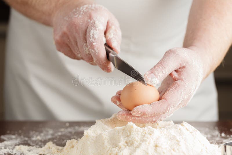 Cook breaking an egg stock photo. Image of homemade, healthy - 78572698