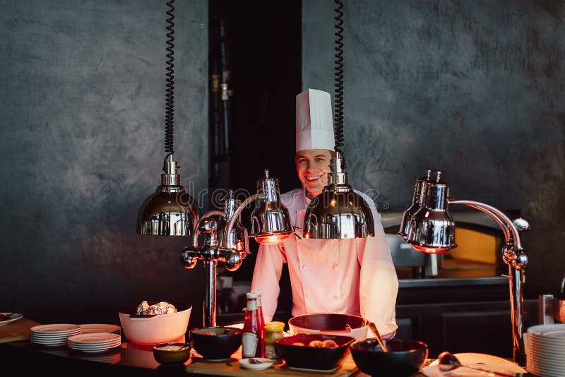Cook at the Buffet in the Interior Stock Image - Image of fresh, cook ...
