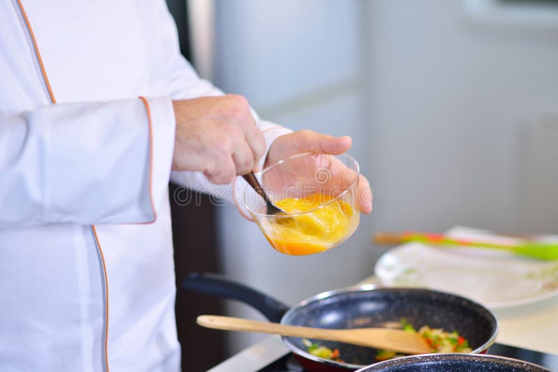 Cook Chef in Kitchen and Fresh Vegetables on Table Stock Image - Image ...