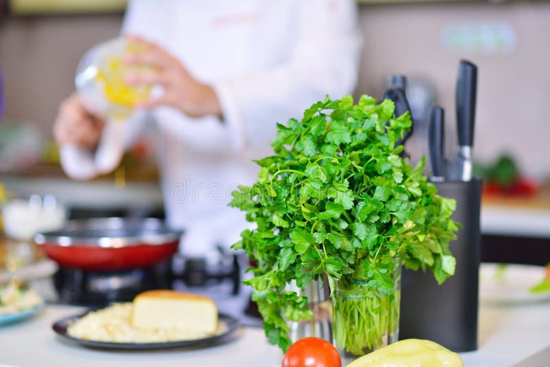 Cook Chef in Kitchen and Fresh Vegetables on Table Stock Image - Image ...
