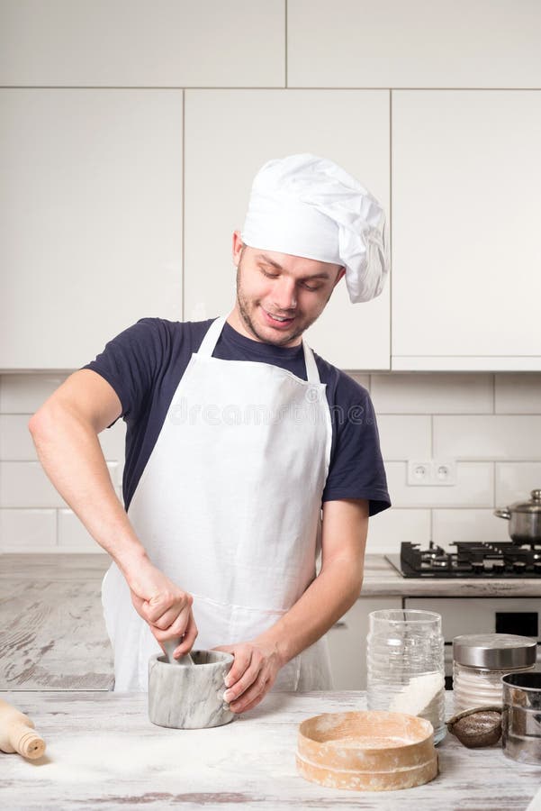 Cook with Mortar and Pestle Stock Photo - Image of toque, ingredients ...