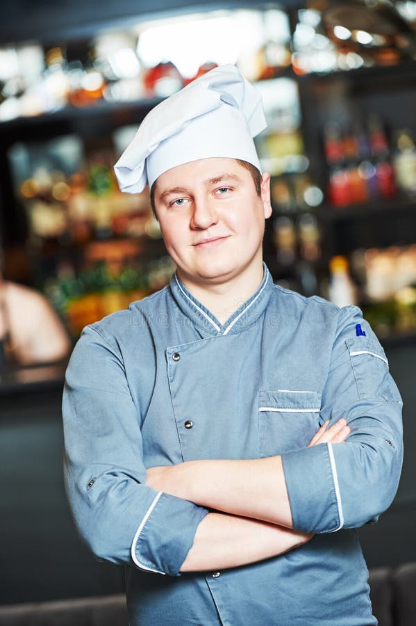 Cook chef at restaurant stock image. Image of indoors - 52013315