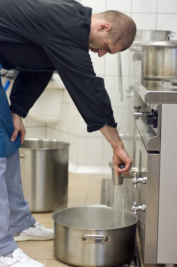Two Cooks Industrial Kitchen Stock Photo - Image of people, mass: 9449092