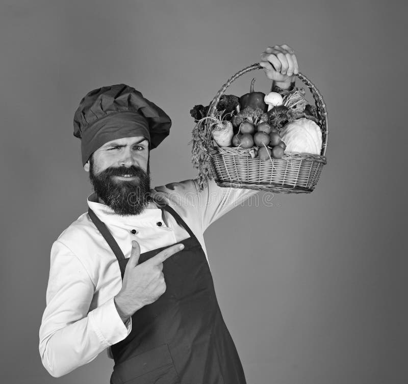 Cook with Confident Face in Burgundy Uniform Points at Vegetables Stock ...