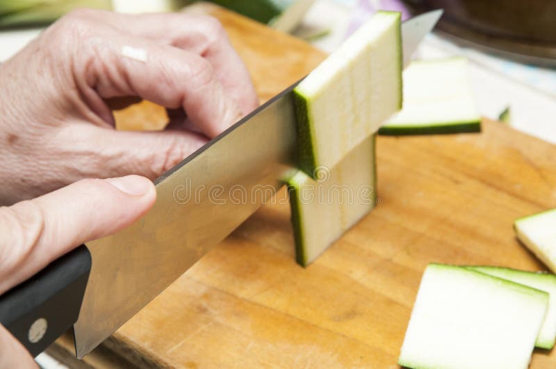 Cook cucumber cut stock photo. Image of chopping, courgette - 38686606