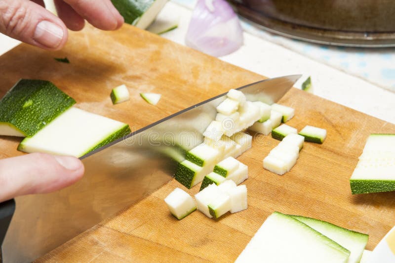 Cook cucumber cut stock photo. Image of knife, courgette - 38686734