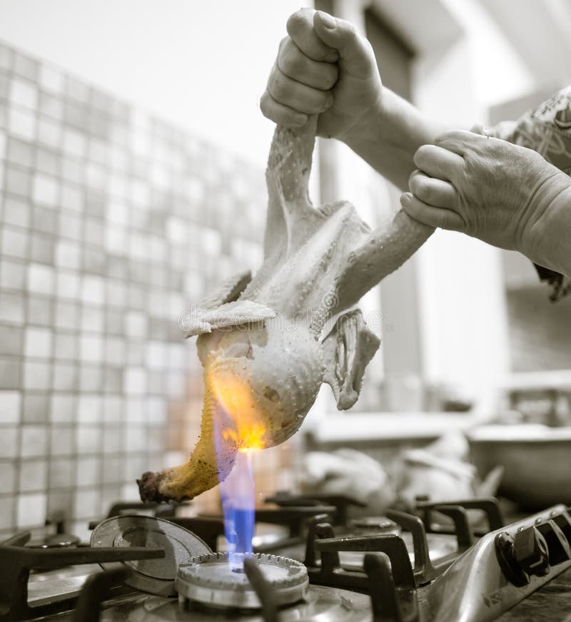 The Cook Cuts the Chicken on Fire Stock Image - Image of breast ...