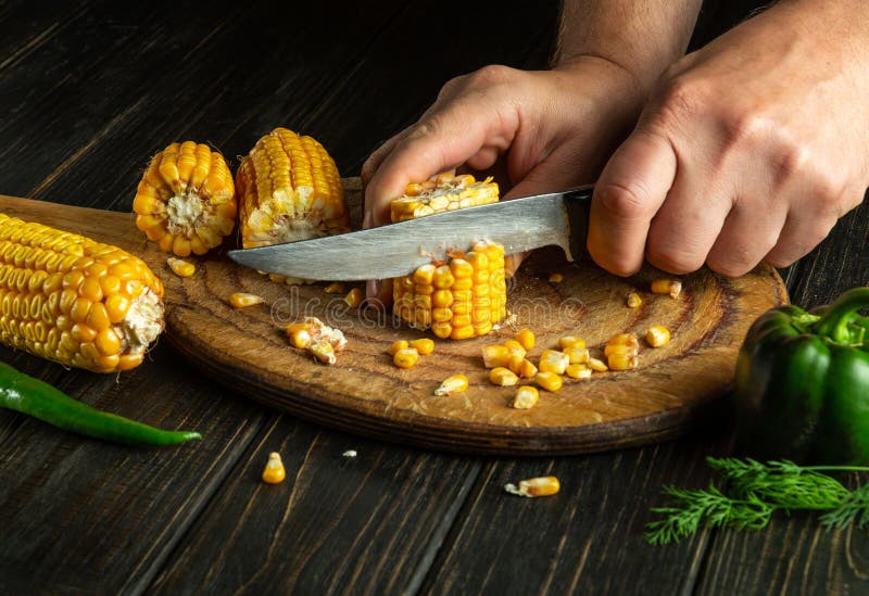The Cook Cuts Corn Kernels with a Knife. Maize is an Excellent Dietary ...