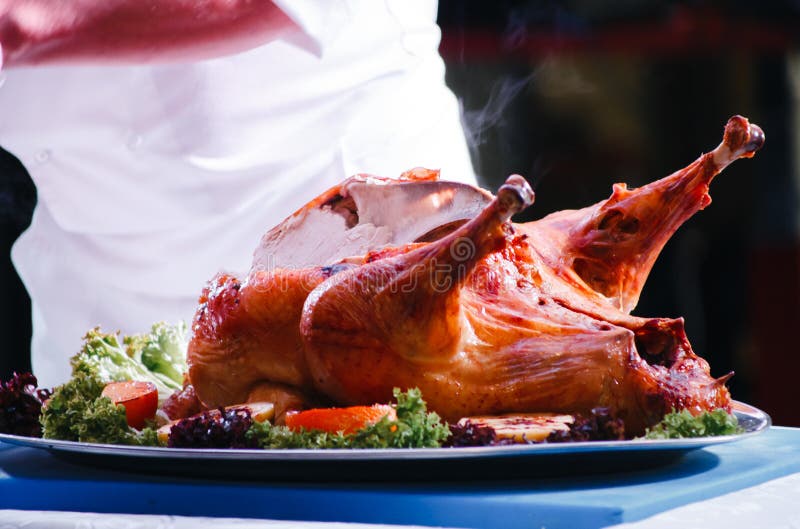 The Cook Cuts the Fried Turkey Stock Image - Image of grilled, cooked ...