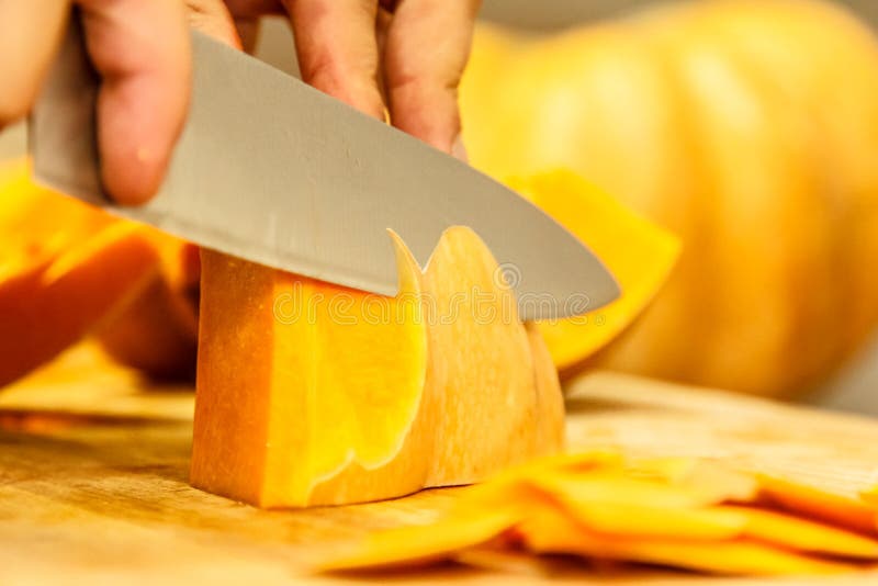 Cook Cuts the Rind from Pumpkin. Stock Image - Image of pumpkin, knife ...