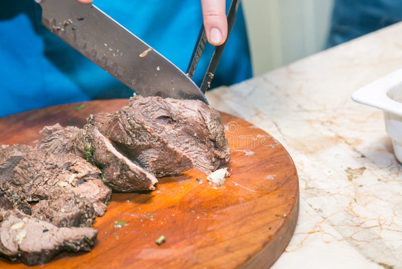 Cook Cuts Roasted Beef Meat. the Concept of Cooking Stock Image - Image ...