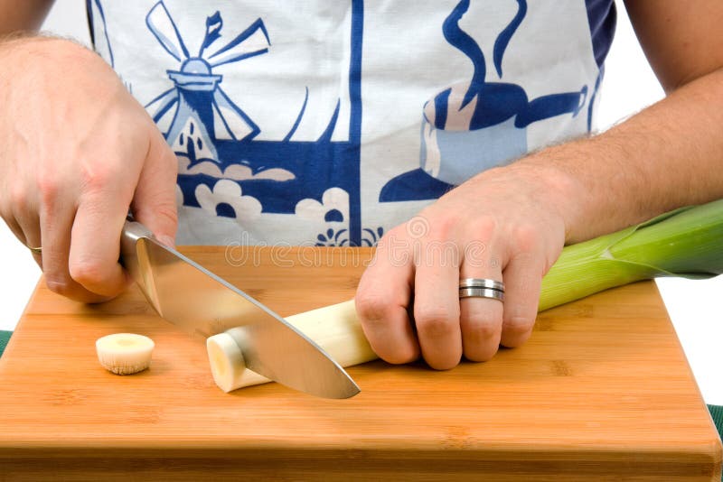 Cook is cutting leek stock photo. Image of cutting, board - 11286952