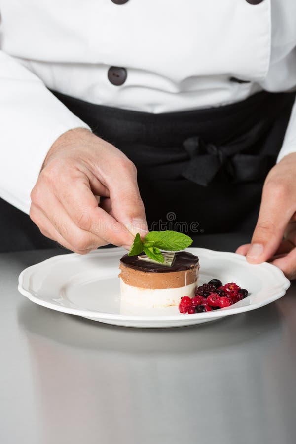 Cook desserts stock photo. Image of adult, coulis, cuisine - 63294872