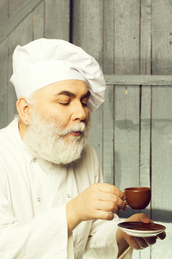 Cook drinking coffee stock photo. Image of kitchen, senior - 122433714