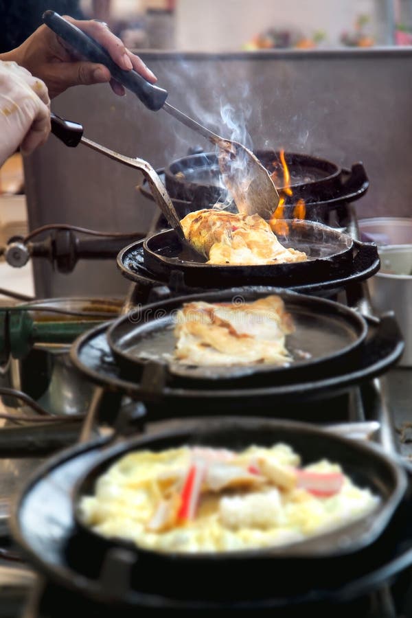 The cook is fried omelet stock image. Image of fresh - 88496069
