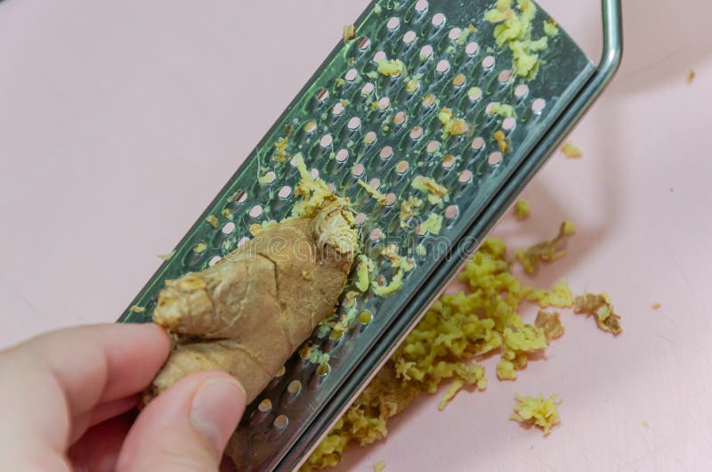 Cook Grating Fresh Ginger Root Stock Image - Image of cook, ingredient ...