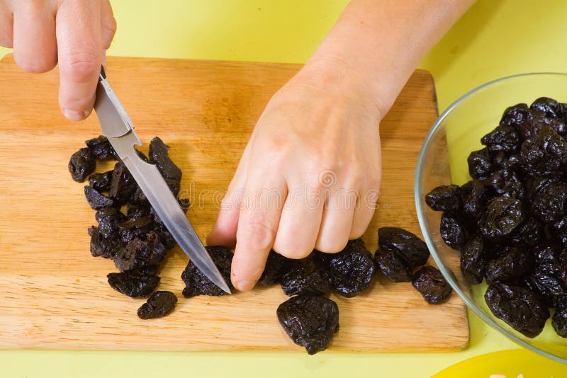 Cook Hands is Slicing Prune Stock Photo - Image of cooking, vegetables ...