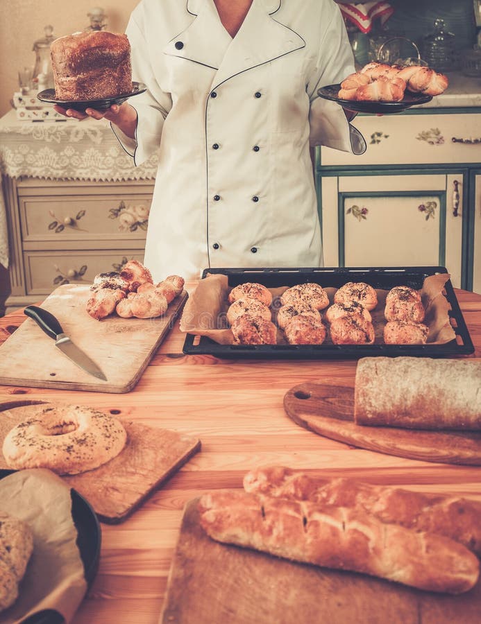 Cook holding baked goods stock image. Image of kneading - 49694939