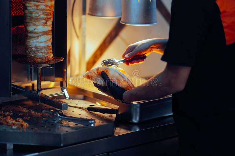 Cook Holding a Flat Bread Making a Middle Eastern Fast Food Dish Stock ...