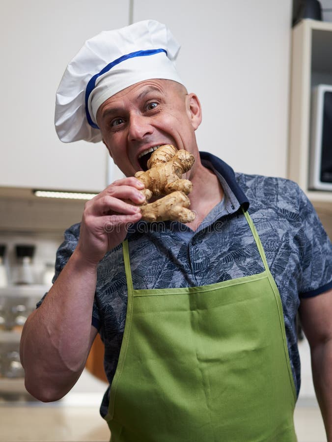 Cook Holding a Piece of Ginger Stock Image - Image of biting, food ...