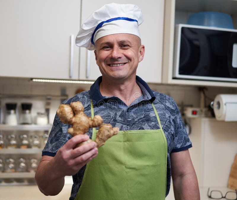 Cook Holding a Piece of Ginger Stock Image - Image of ingredient, white ...