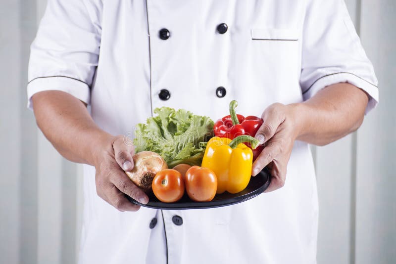 Cook Holds Tray of Vegetable Stock Image - Image of cooking, restaurant ...