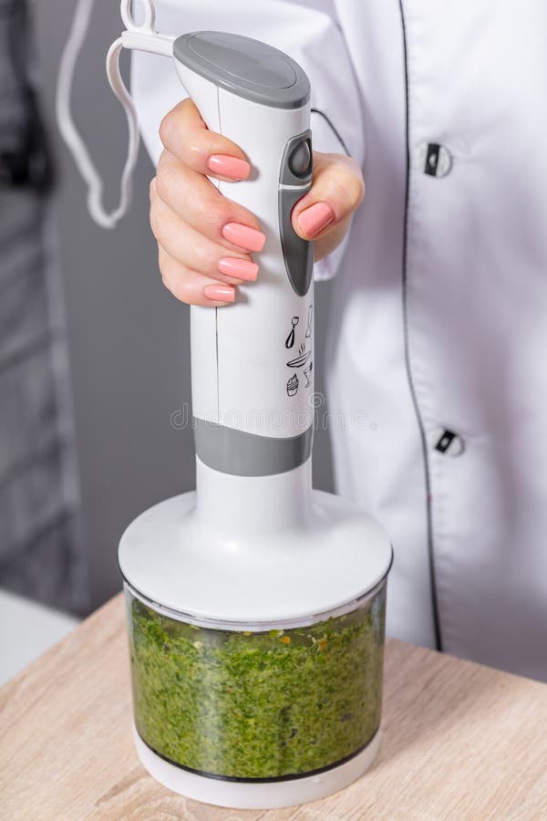 Cook Interrupts Hot Green Pepper in a Blender Stock Photo - Image of ...