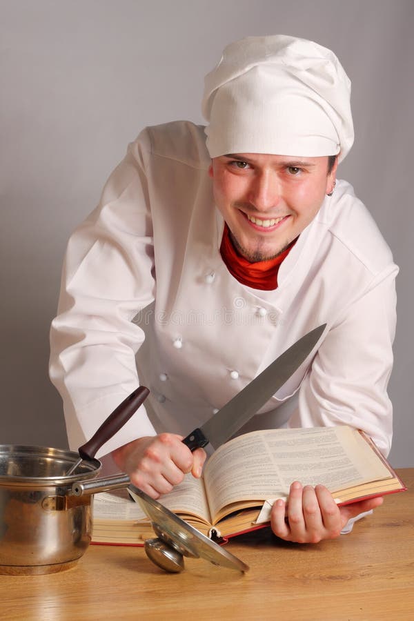 The cook with a knife stock image. Image of cook, color - 11019461