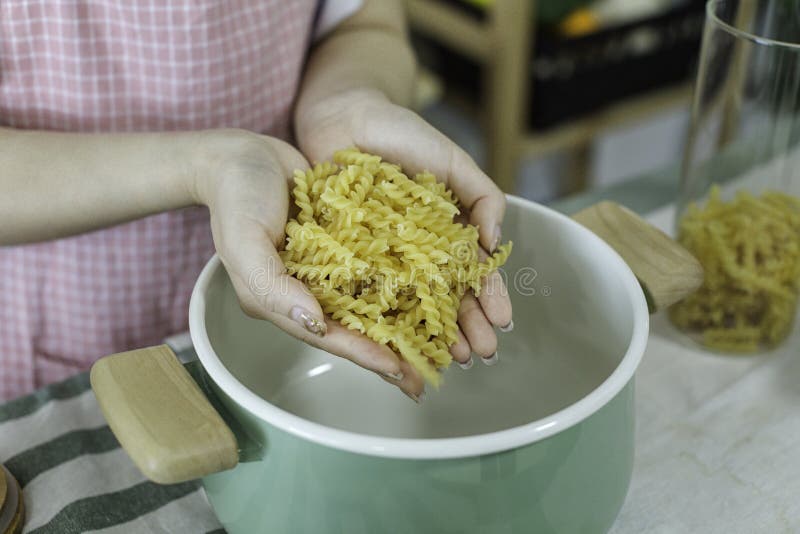 The Cook is Making Macaroni. Closeup of Process of Making Cooking ...
