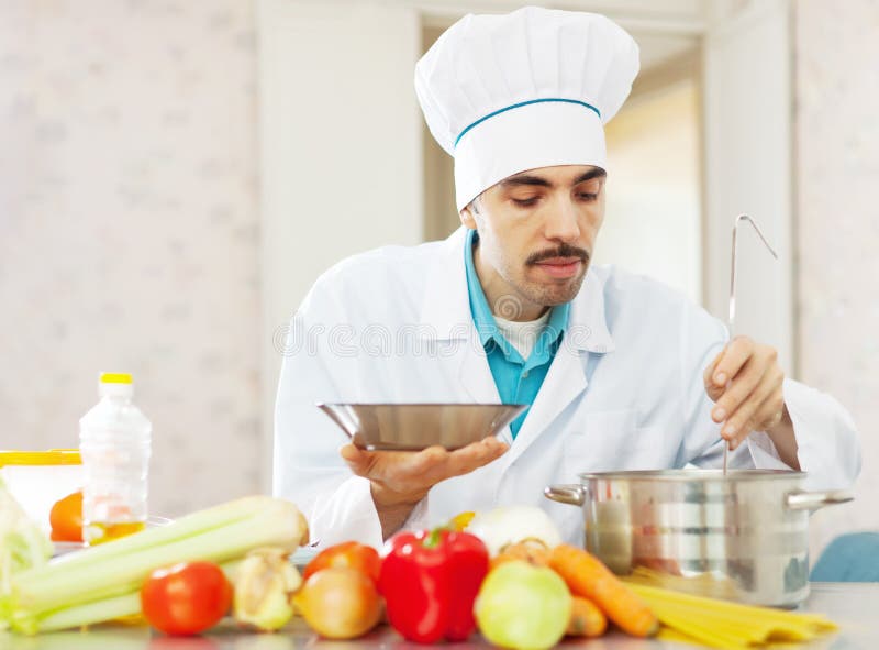 Cook Man Tasting Soup from Pan Stock Photo - Image of male, people ...