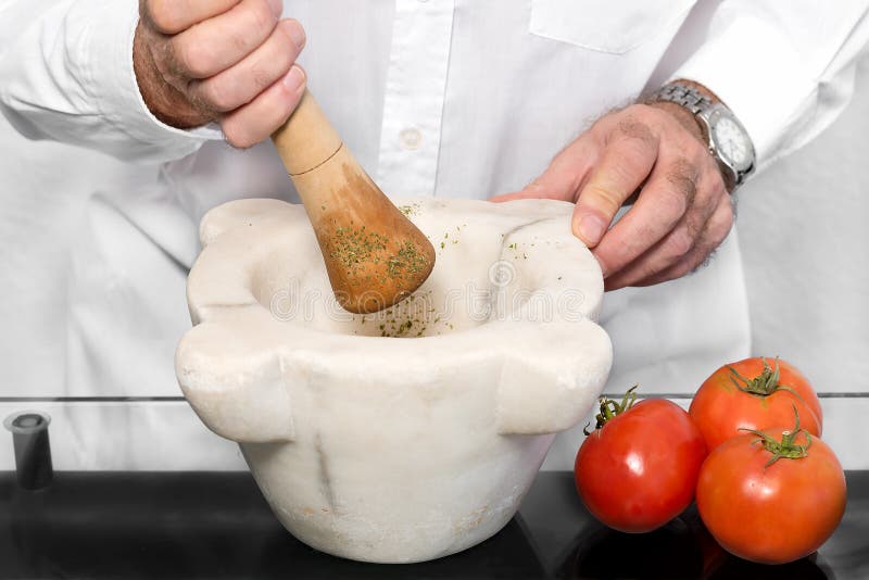 Cook with Mortar and Pestle Stock Photo - Image of toque, ingredients ...