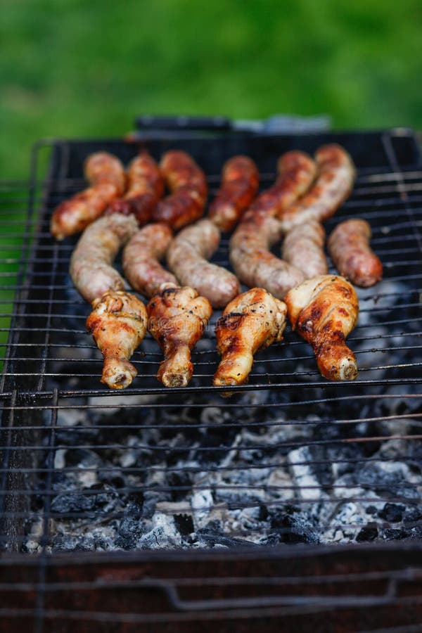 Cook Out. Sausages and Chicken on Grill Stock Photo - Image of fresh ...