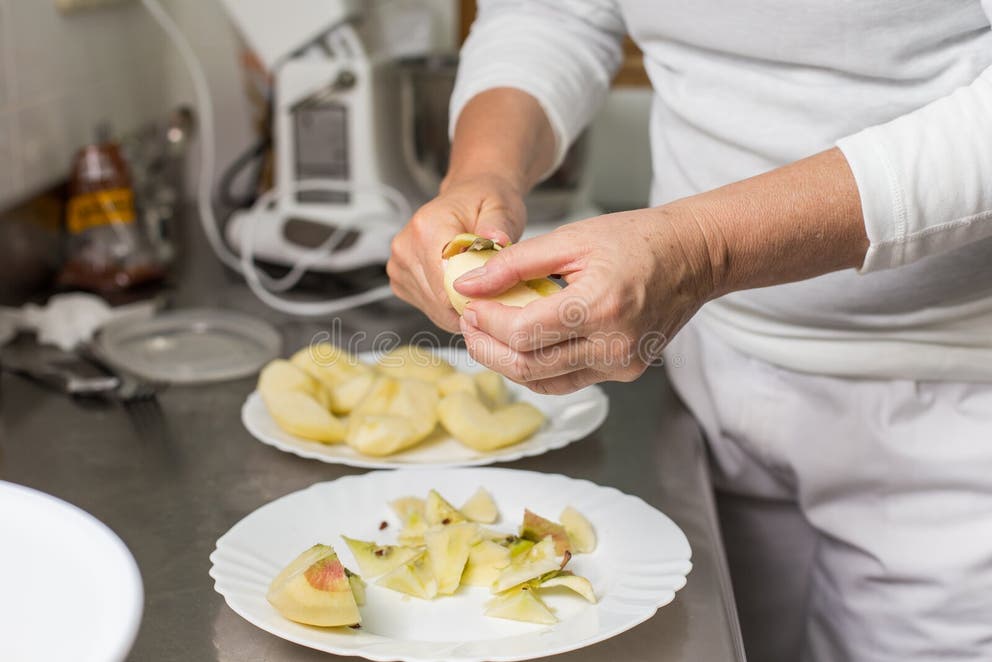 Cook Peeling Apples in the Kitchen Stock Image - Image of knife ...