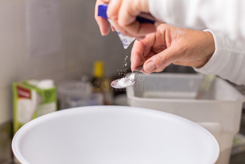 Cook pouring baking powder stock image. Image of cooking - 67643383