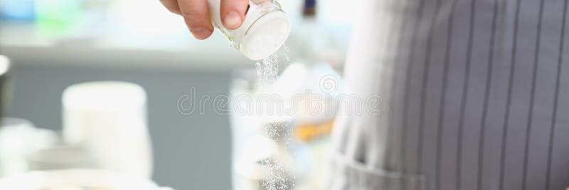 Cook Pours Salt into Pan in Kitchen Stock Photo - Image of interaction ...