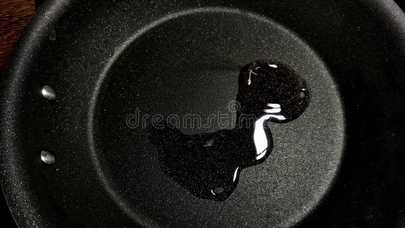 The Cook Pours Vegetable Oil into a Frying Pan Stock Footage - Video of ...