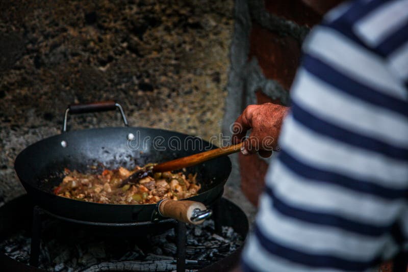The Cook Prepares Food in Nature Stock Image - Image of fried, frying ...