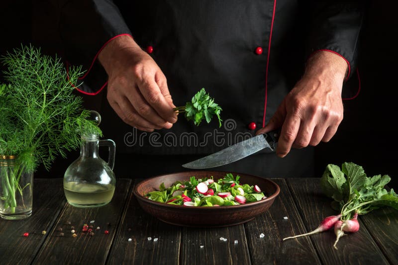 The Cook Prepares Fresh Vegetable Salad. the Idea of a Diet Breakfast ...