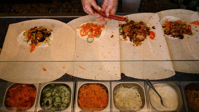 The Cook Prepares Shawarma from Vegetables and Meat, Four Sheets of ...