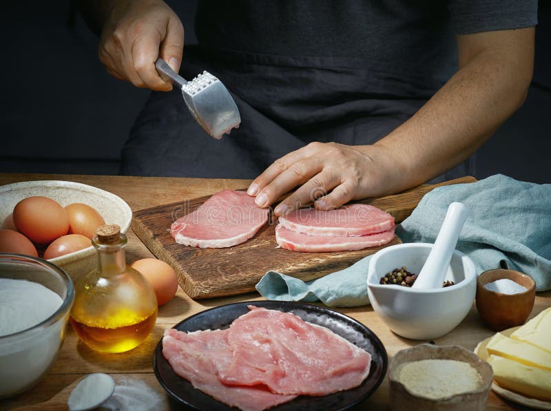 Cook is preparing meat stock photo. Image of butcher - 111437810
