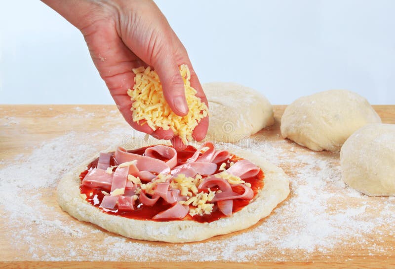 Cook preparing pizza stock image. Image of bread, food - 24416899