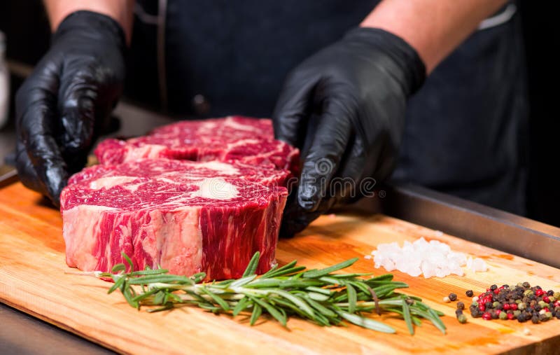 Cook preparing steak stock photo. Image of food, healthy - 135279816
