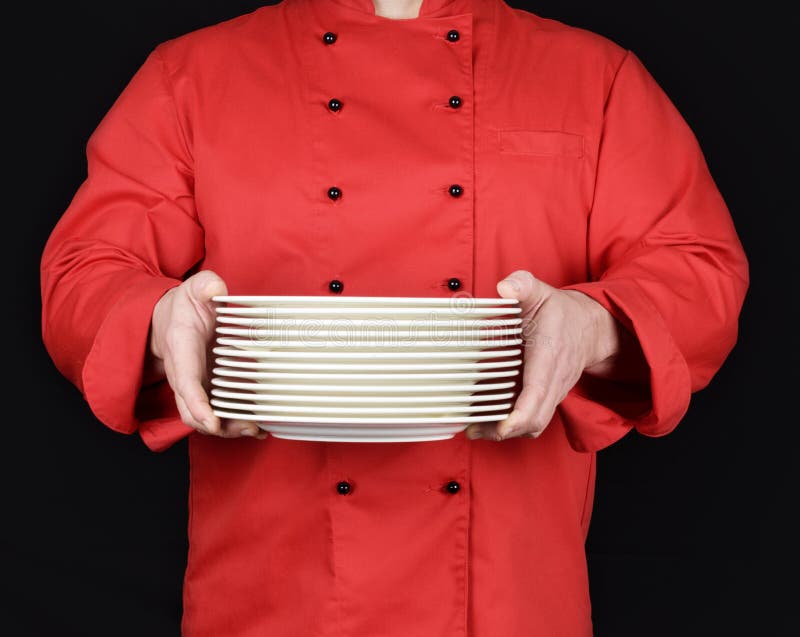 Cook in Red Uniform Holds Round White Empty Plates Stock Image - Image ...