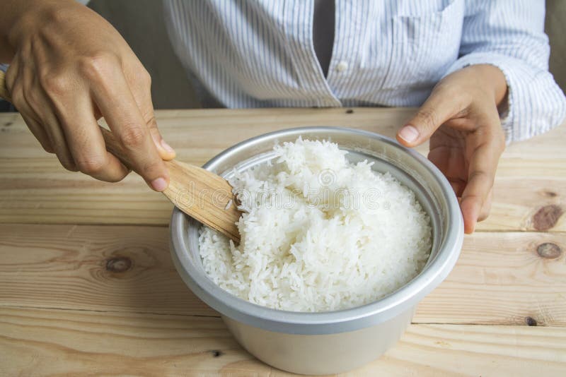 Cook rice in a pot stock photo. Image of organic, cooked - 95418278