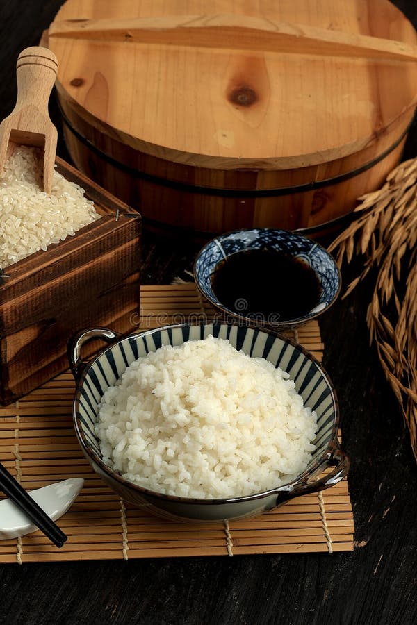 Cook Rice in a Traditional Japanese Rice Cooker Stock Photo - Image of ...