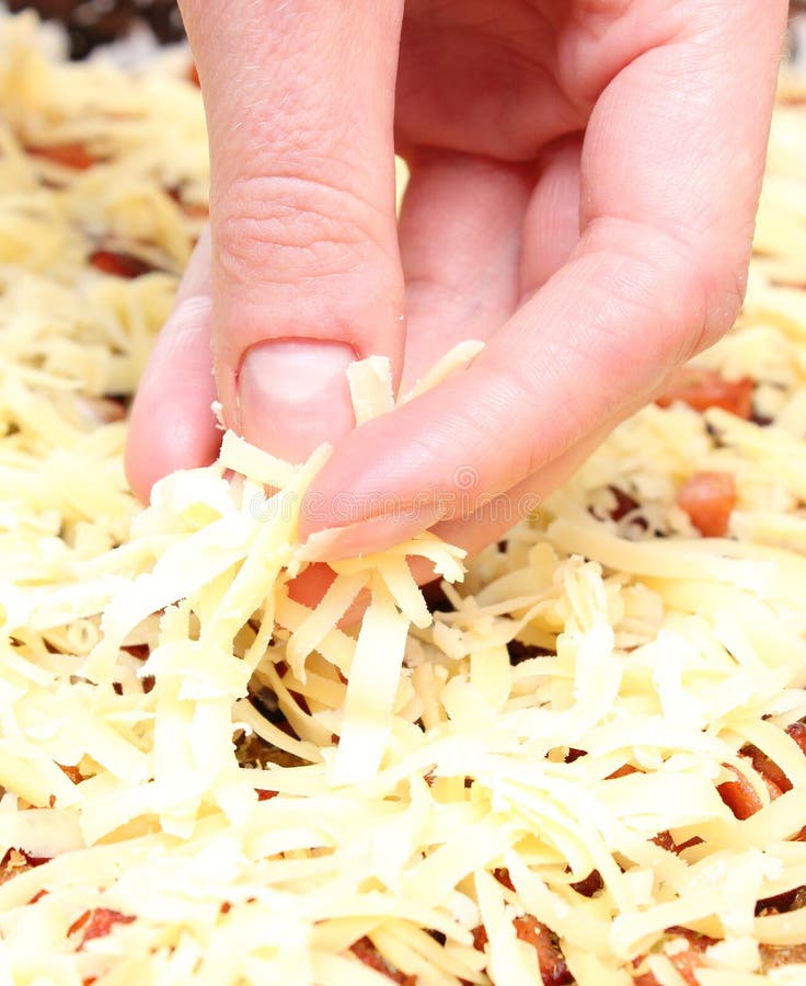 Putting Cheese on the Pizza Stock Photo - Image of italian, freshness ...