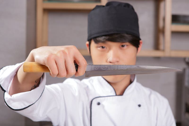 Cook shows sharp knife stock image. Image of asia, oriental - 53131667