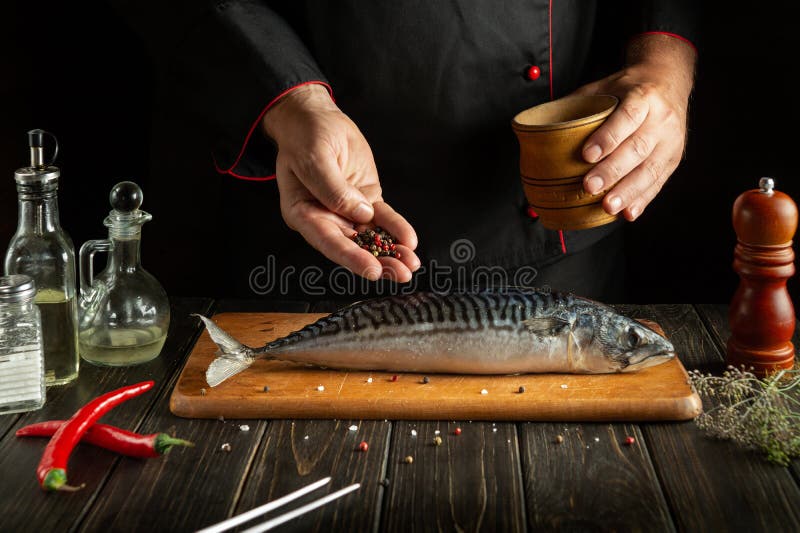 The Cook Spices Mackerel in the Hotel Kitchen. Scomber is a Delicious ...