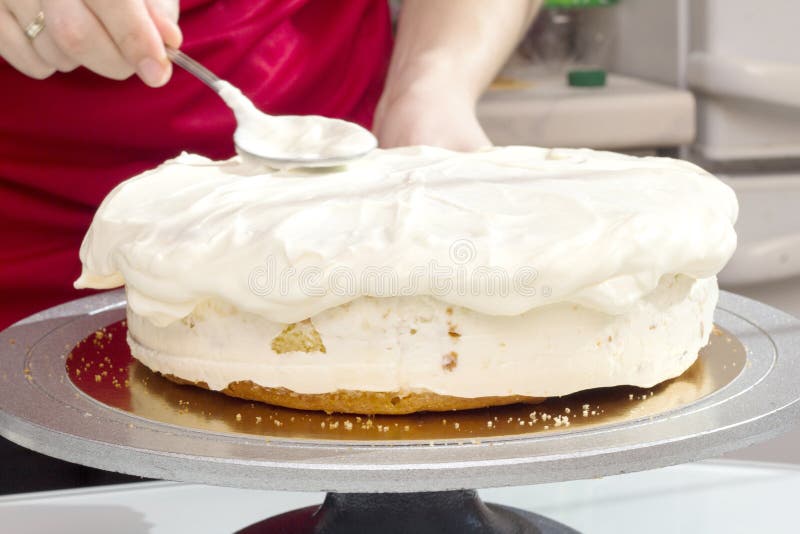 Cook Spreads Cream on the Cake Stock Image - Image of tasty, baking ...
