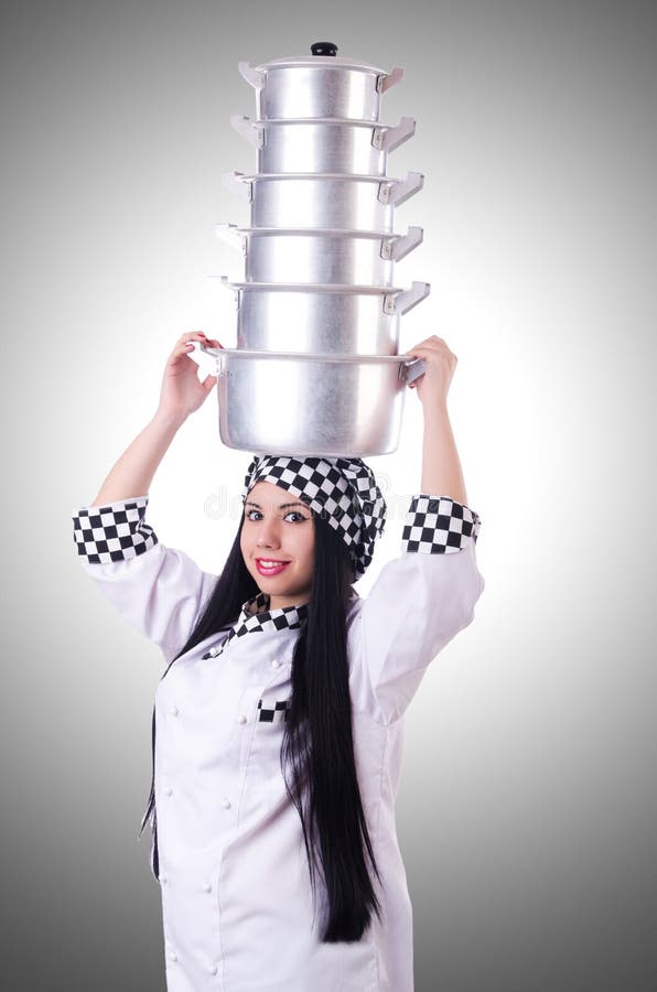 Cook with stack of pots stock photo. Image of domestic - 46982806